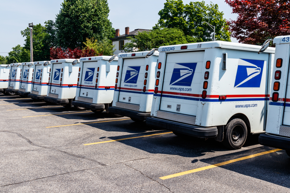 USPS prices increase after announcing $9.6 billion electric vehicle ...